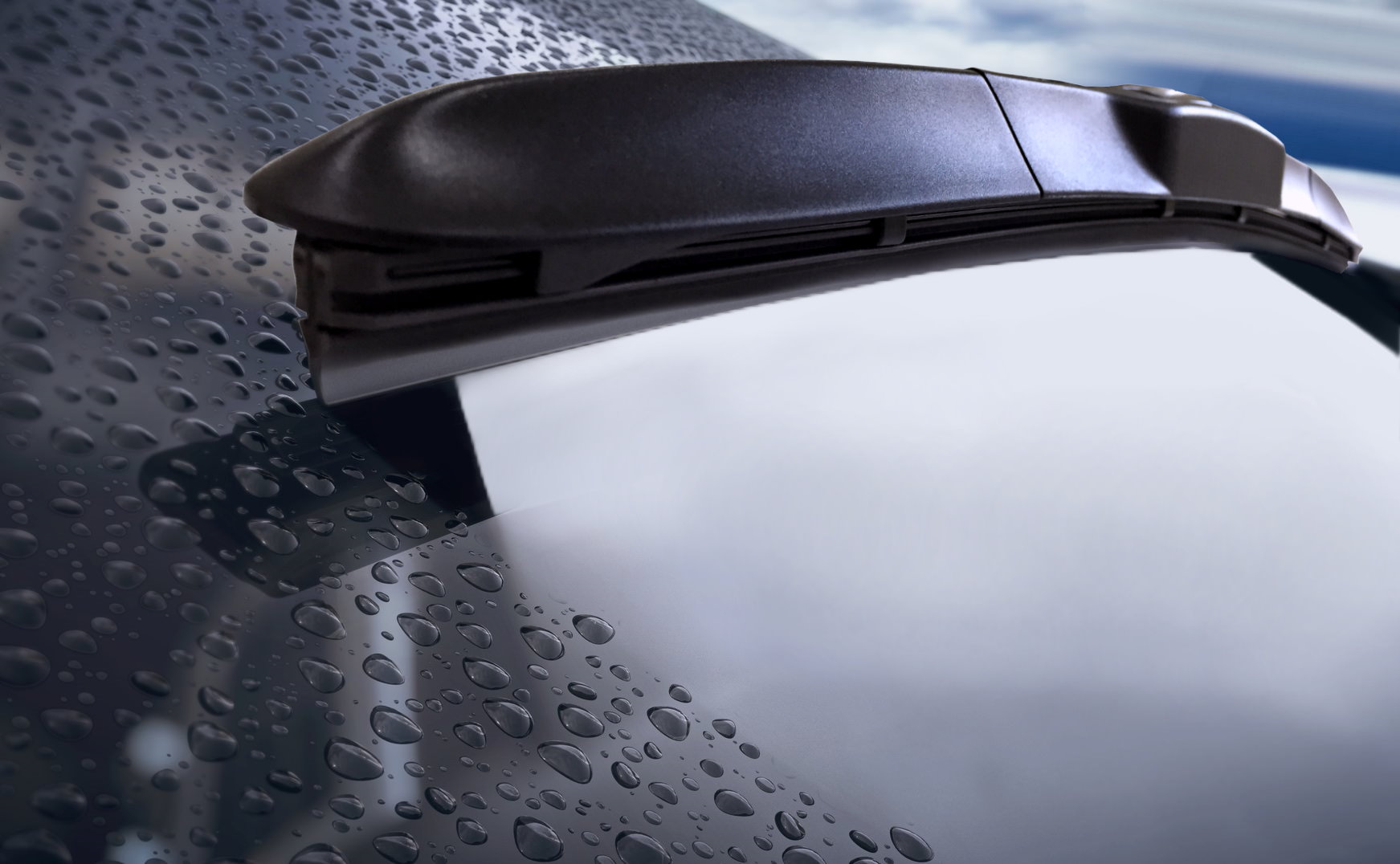 Car windshield with rain drops and frameless wiper blade closeup. 3d ...